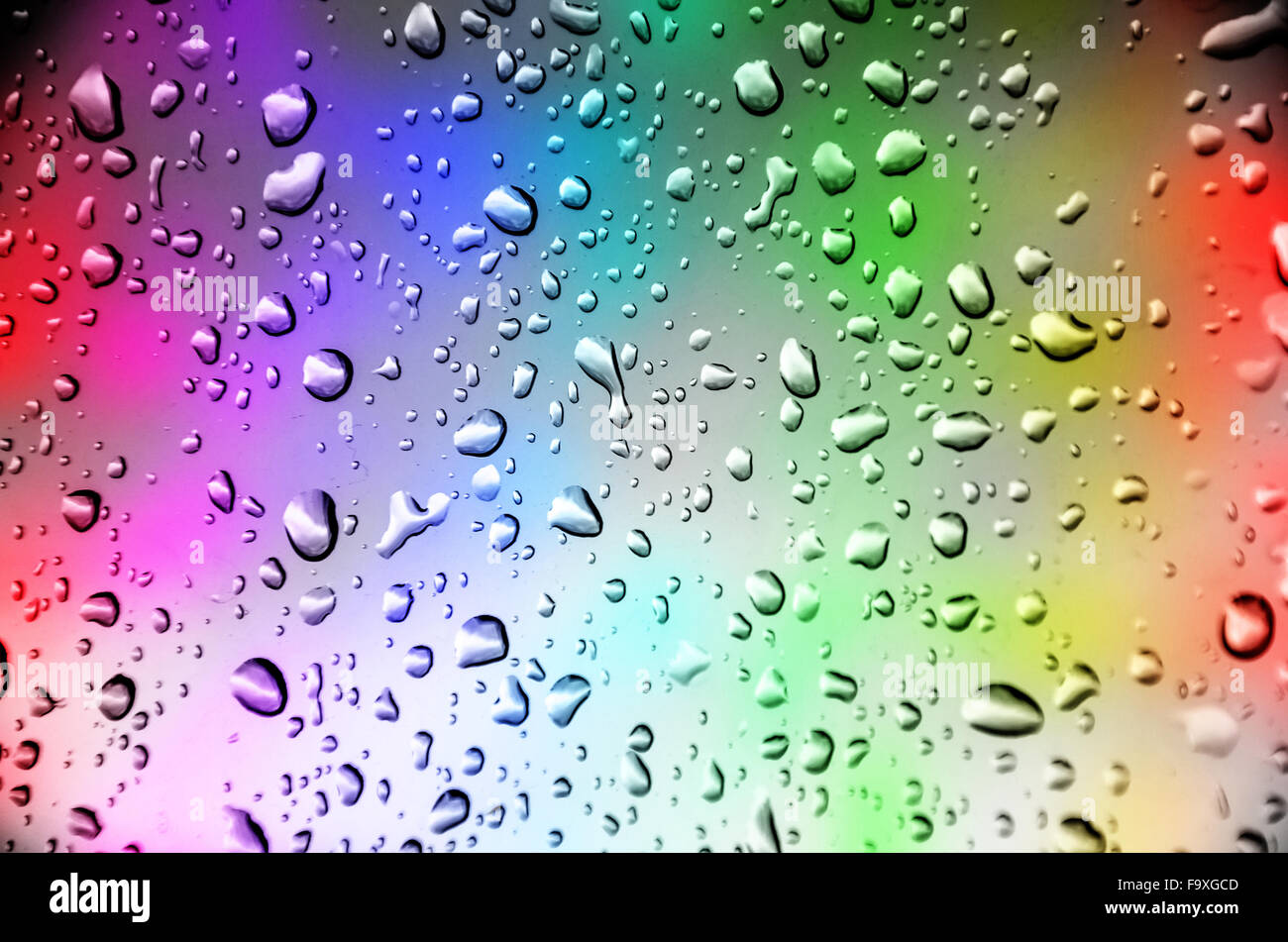 abstract multicolor color background with drop water Stock Photo - Alamy