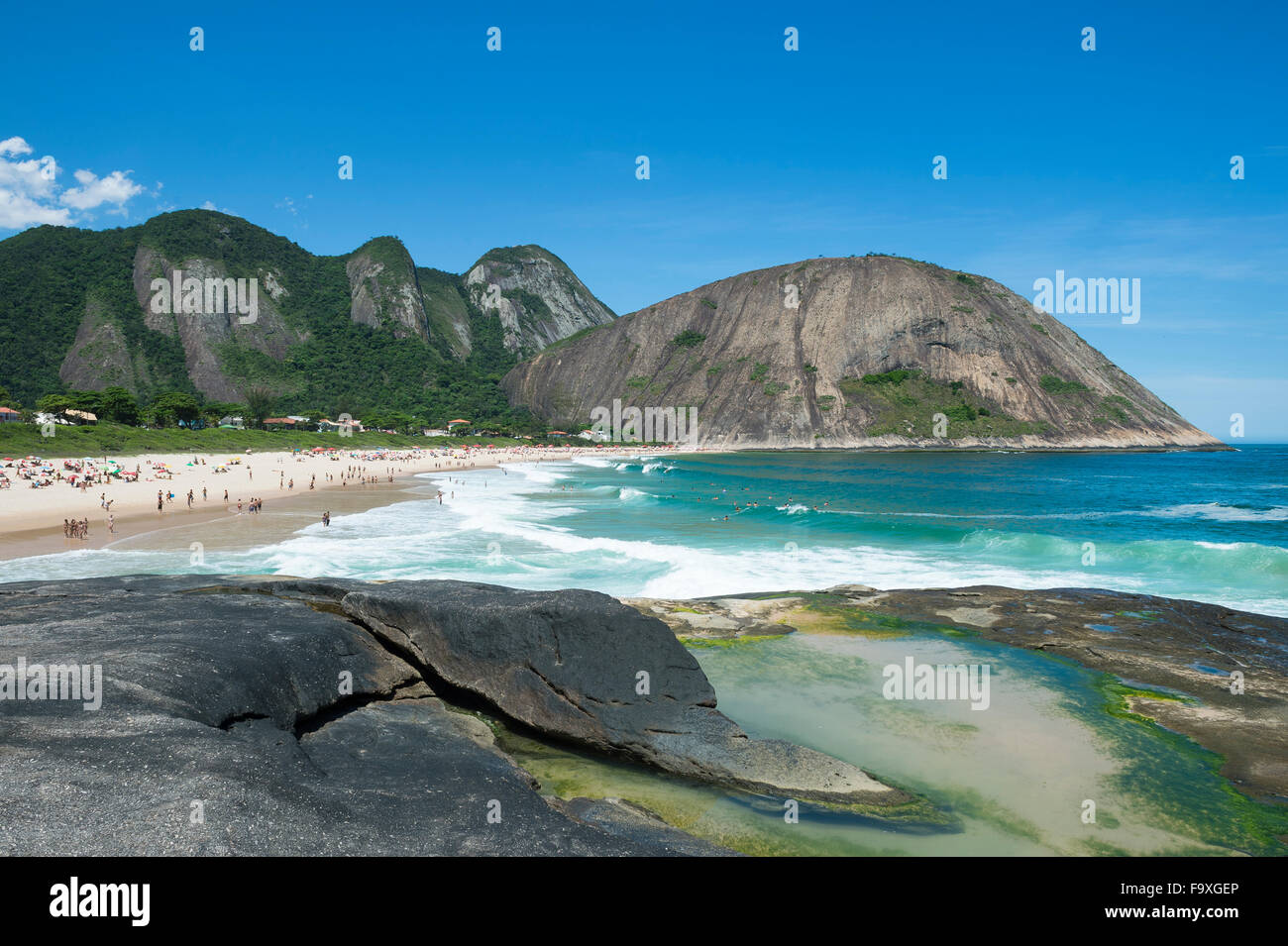 Bright view of Itacoatiara Beach from the dramatic rocks of the sea ...