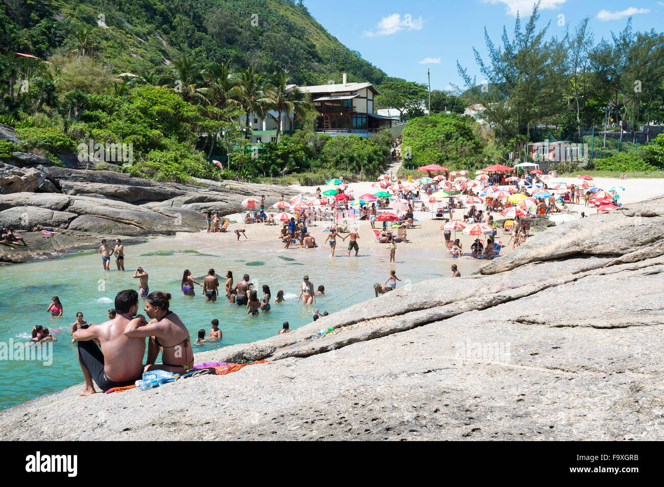 RIO DE JANEIRO, BRAZIL - OCTOBER 31, 2015: Beachgoers take advantage of ...