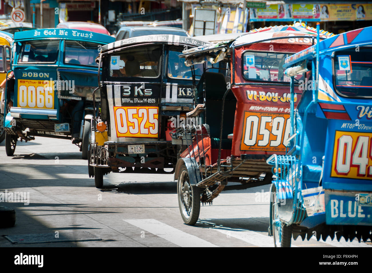Filipino tricycles caught up in hi-res stock photography and images - Alamy
