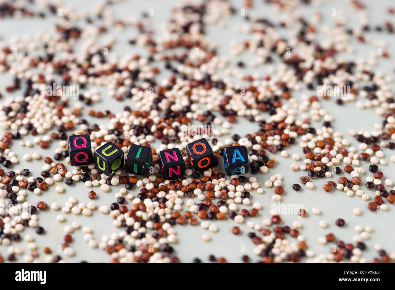 Scattered mixture of quinoa and cubes building the word 'quinoa' Stock ...
