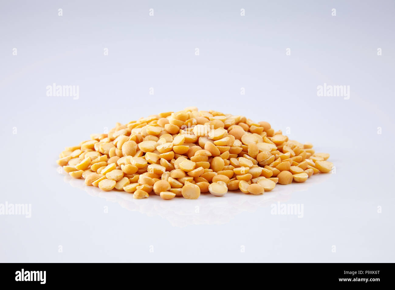 yellow daal on the white background Stock Photo - Alamy