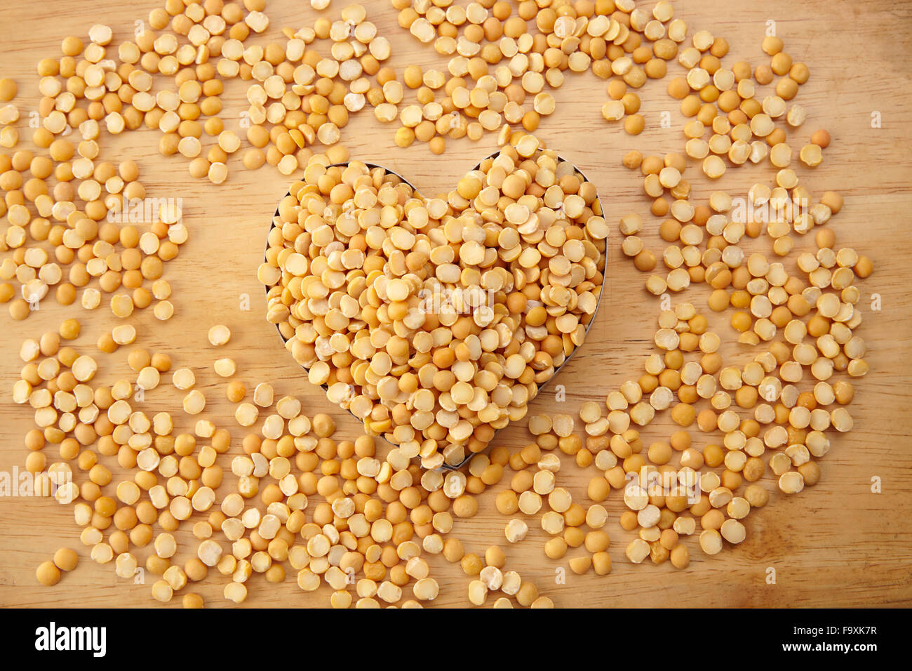 Yellow lentils in shape hi-res stock photography and images - Alamy