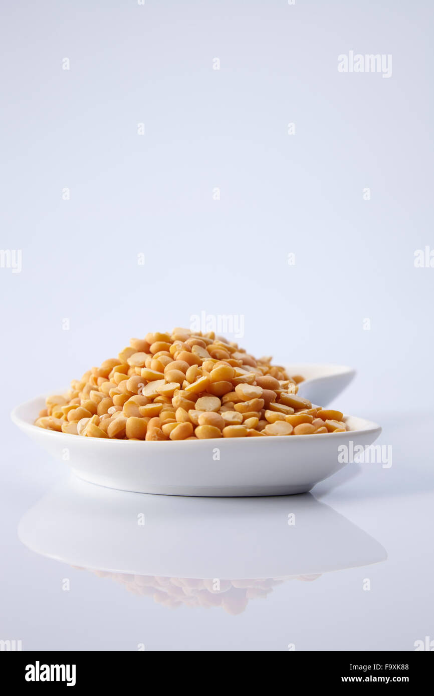 yellow daal on the white background Stock Photo - Alamy