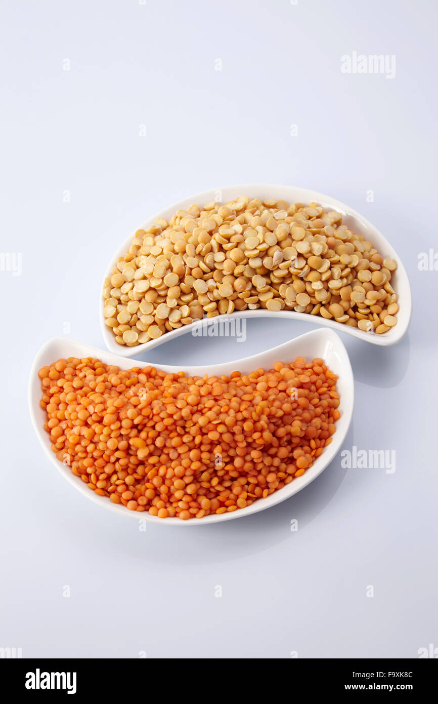 red and yellow daal on the white background Stock Photo - Alamy