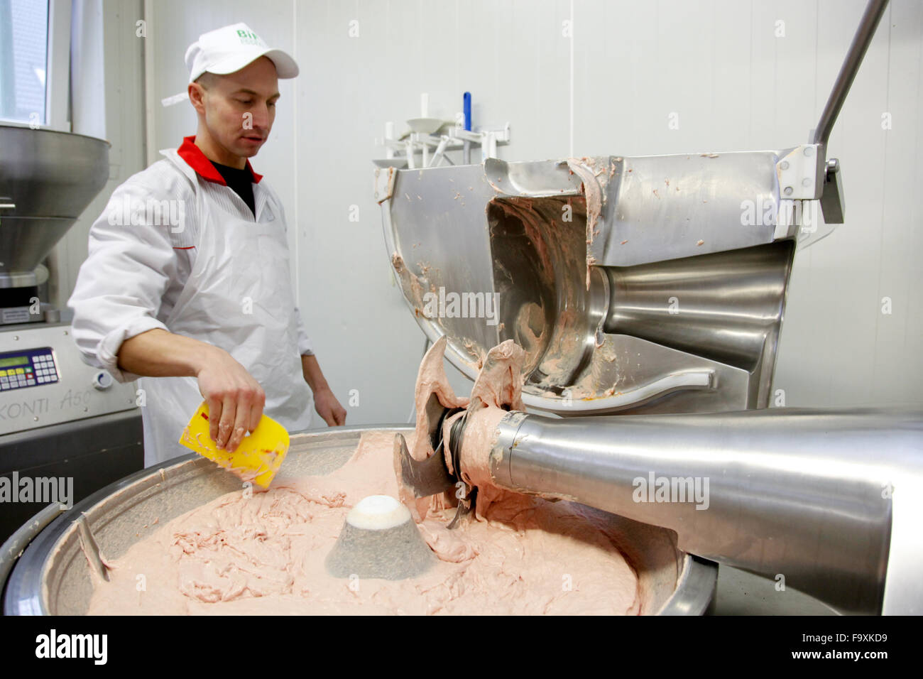 Butcher making sausages Stock Photo - Alamy