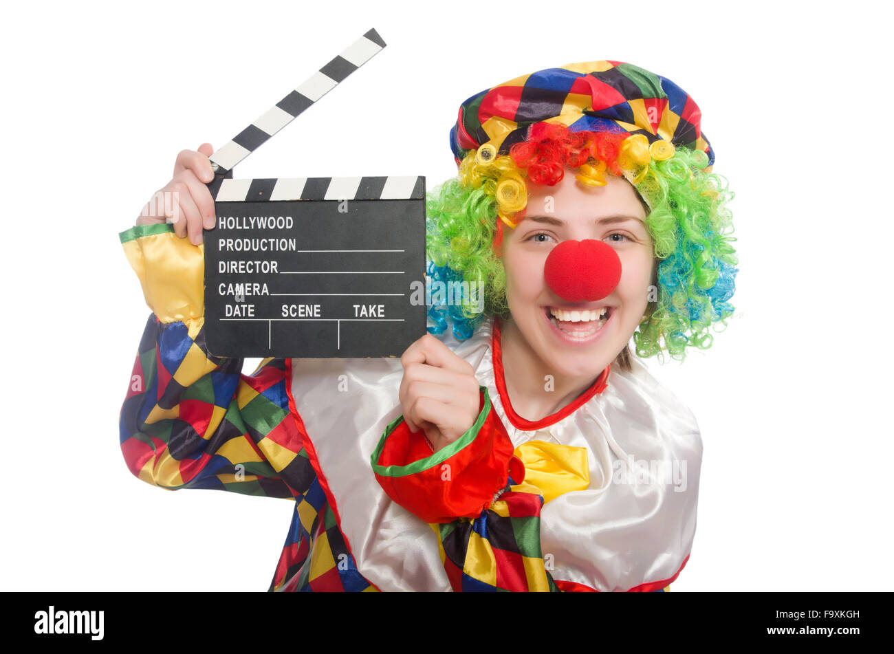 Clown with movie clapper isolated on white Stock Photo - Alamy