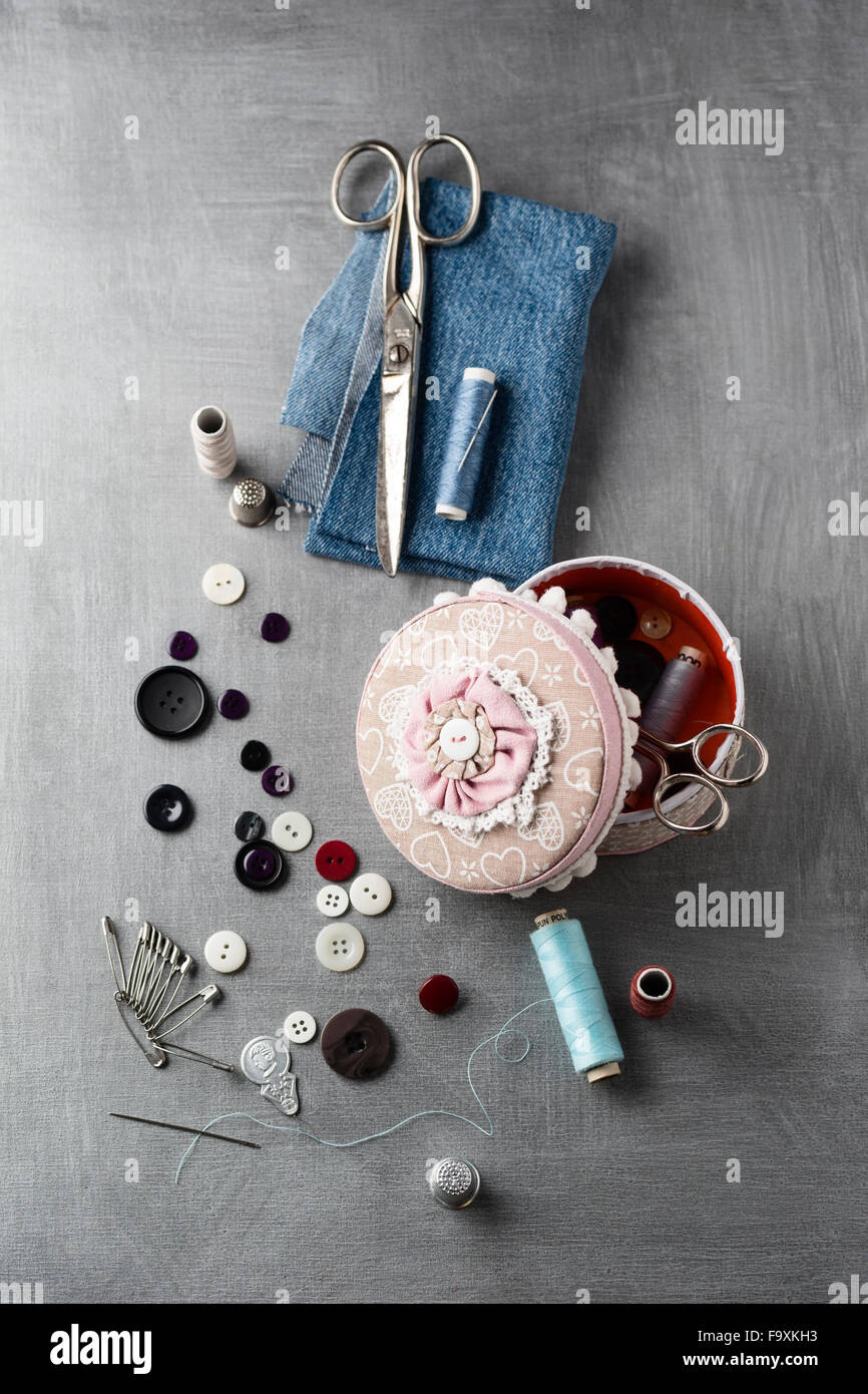 Haberdashery on grey background Stock Photo - Alamy