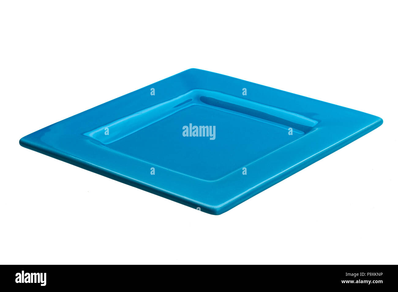 Empty plate isolated on white Stock Photo - Alamy