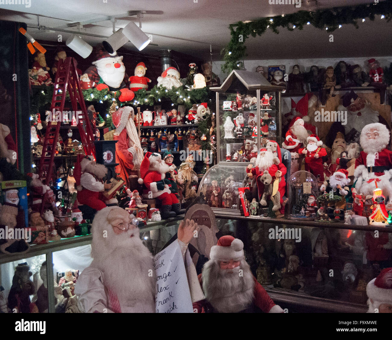 December 18, 2015: Various Santa Claus' line up the Santa the shelves ...