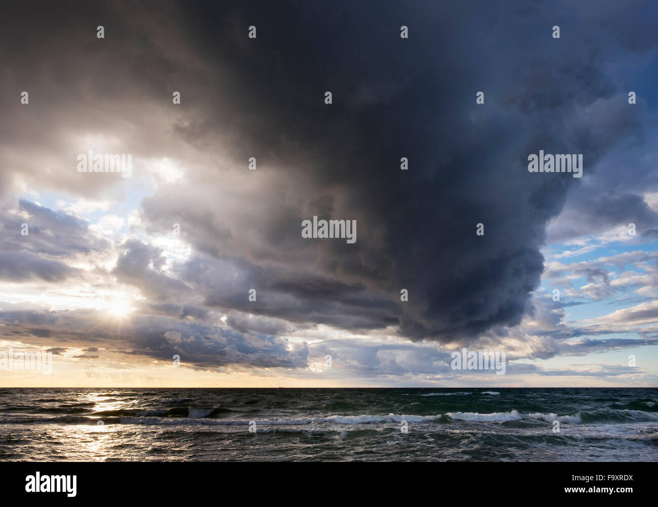 Germany, Mecklenburg-Western Pomerania, rain clouds over Baltic Sea ...