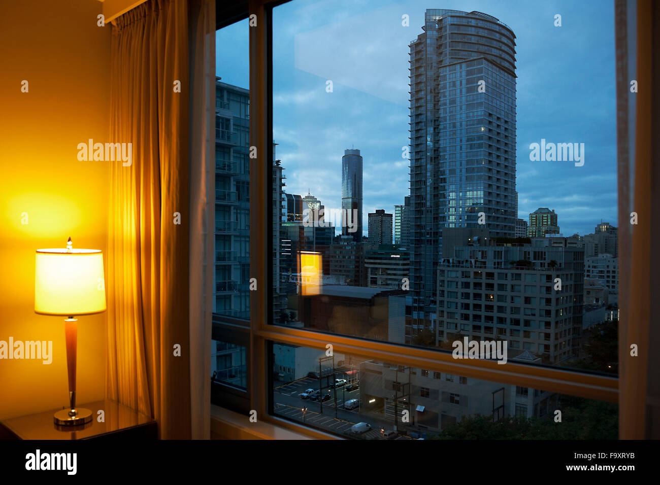Canada, Vancouver, skyscraper seen through window of hotel room Stock ...