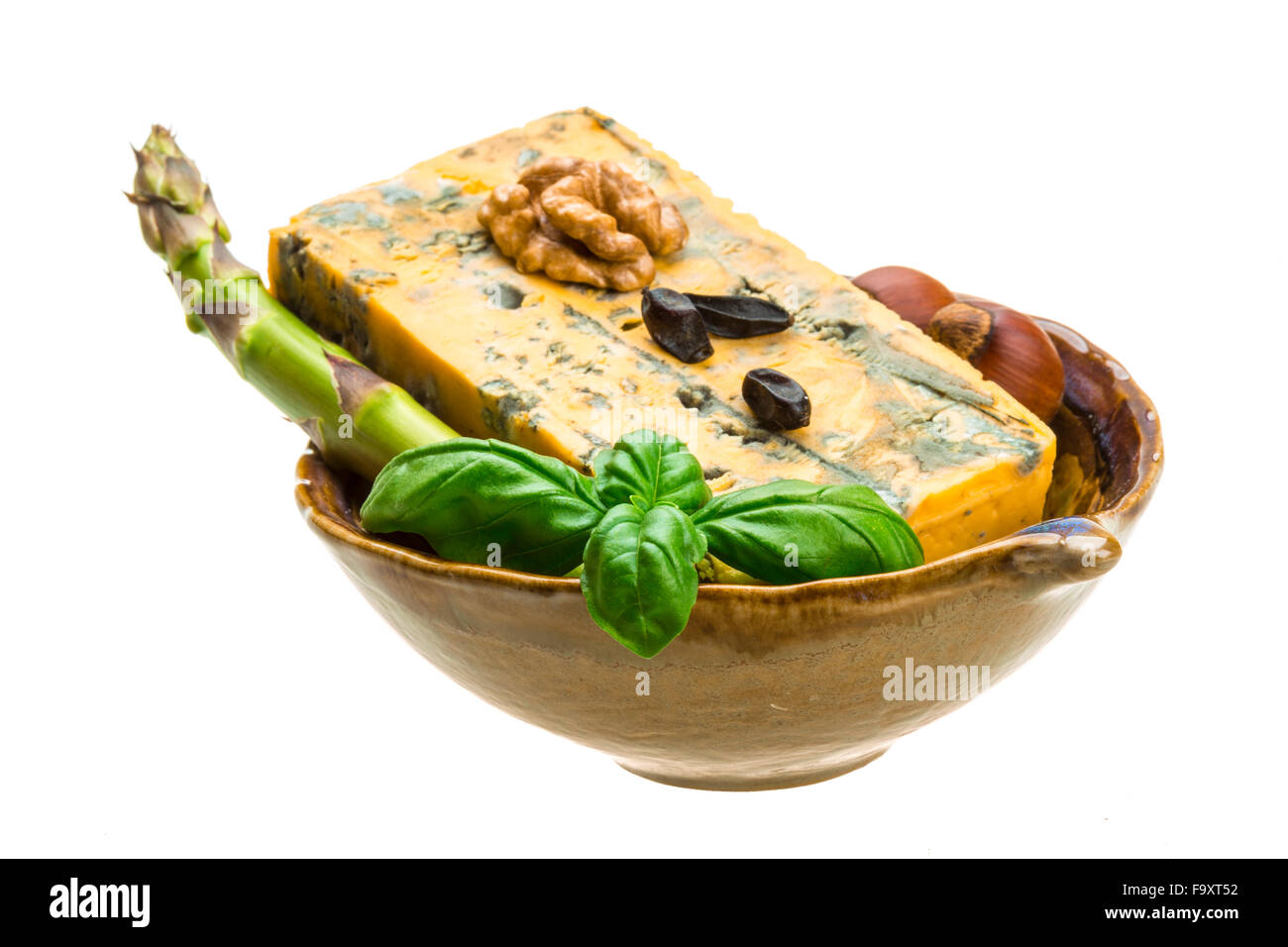 Gold cheese with mould Stock Photo - Alamy