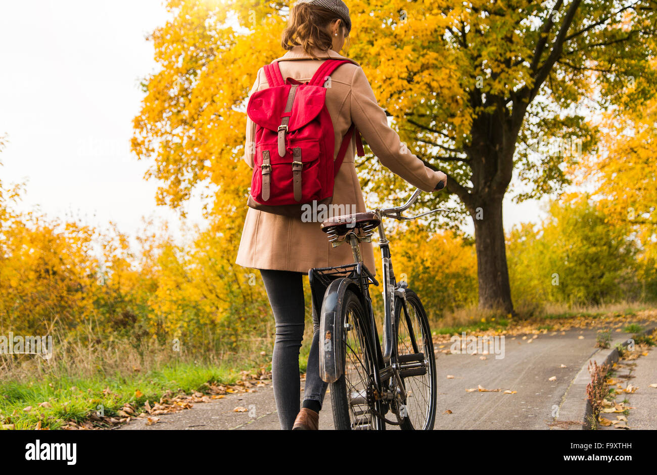 Woman Pushing Her Bicycle High Resolution Stock Photography and Images ...