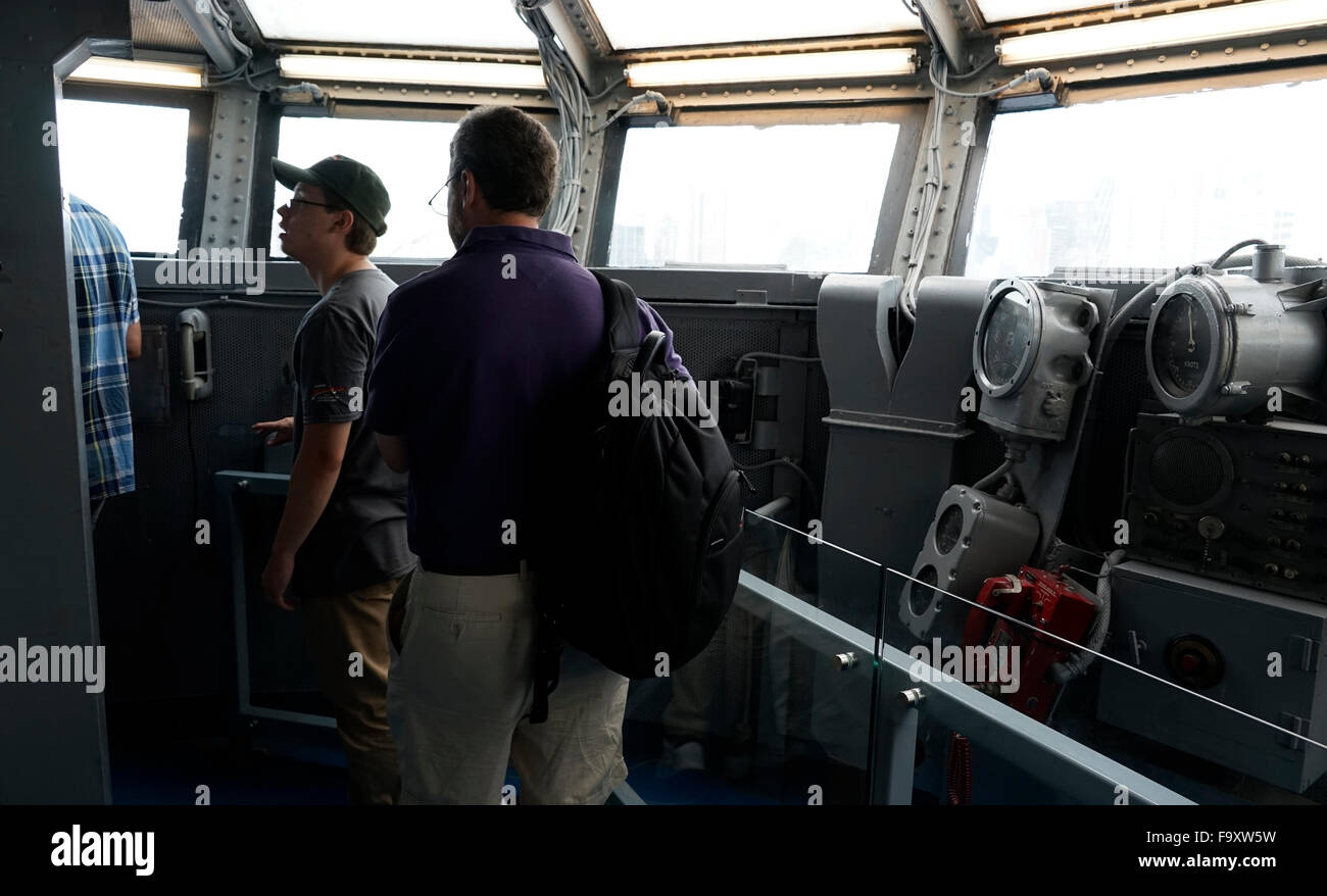 Visitors inside of the bridge of Intrepid aircraft carrier. the ...