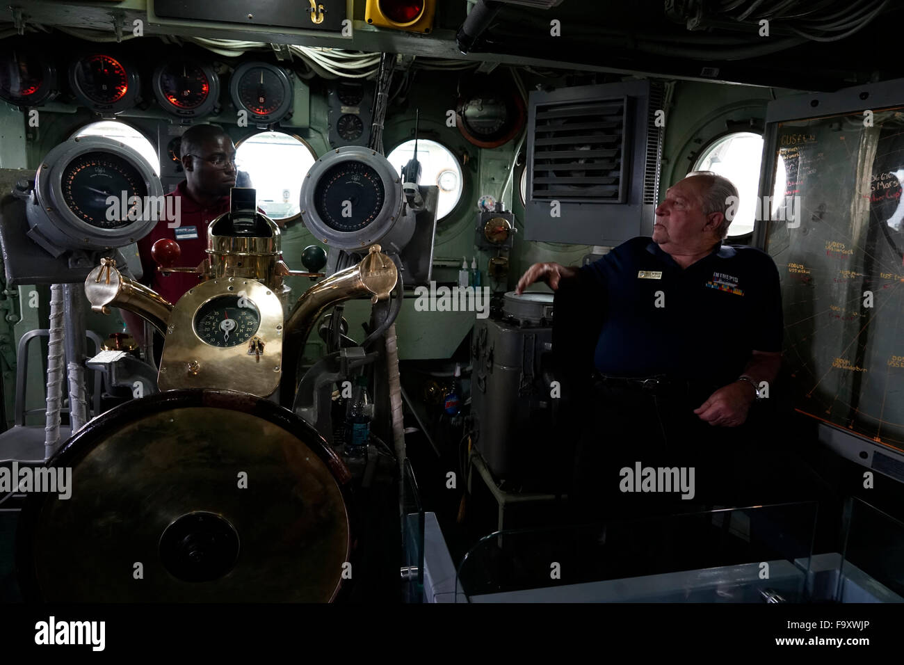 A naval veteran inside of the bridge of Intrepid aircraft carrier. the ...