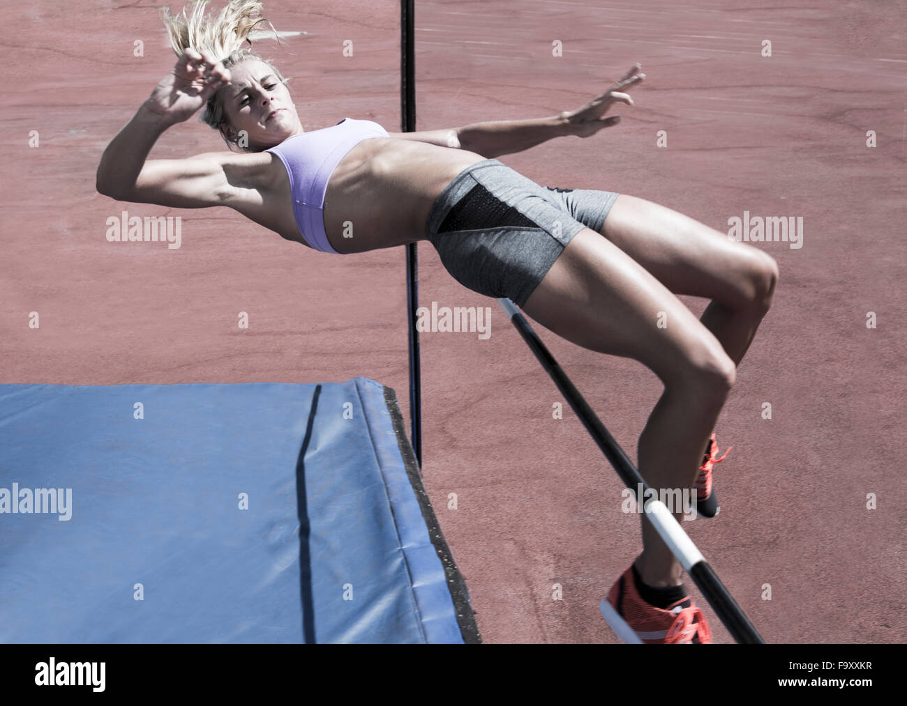 Female high jumper hi-res stock photography and images - Alamy