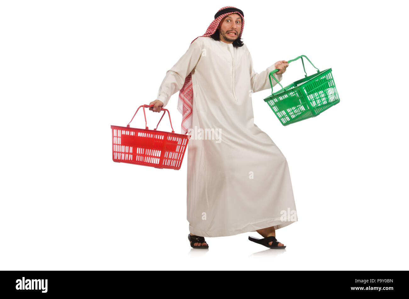 Arab man doing shopping isolated on white Stock Photo - Alamy