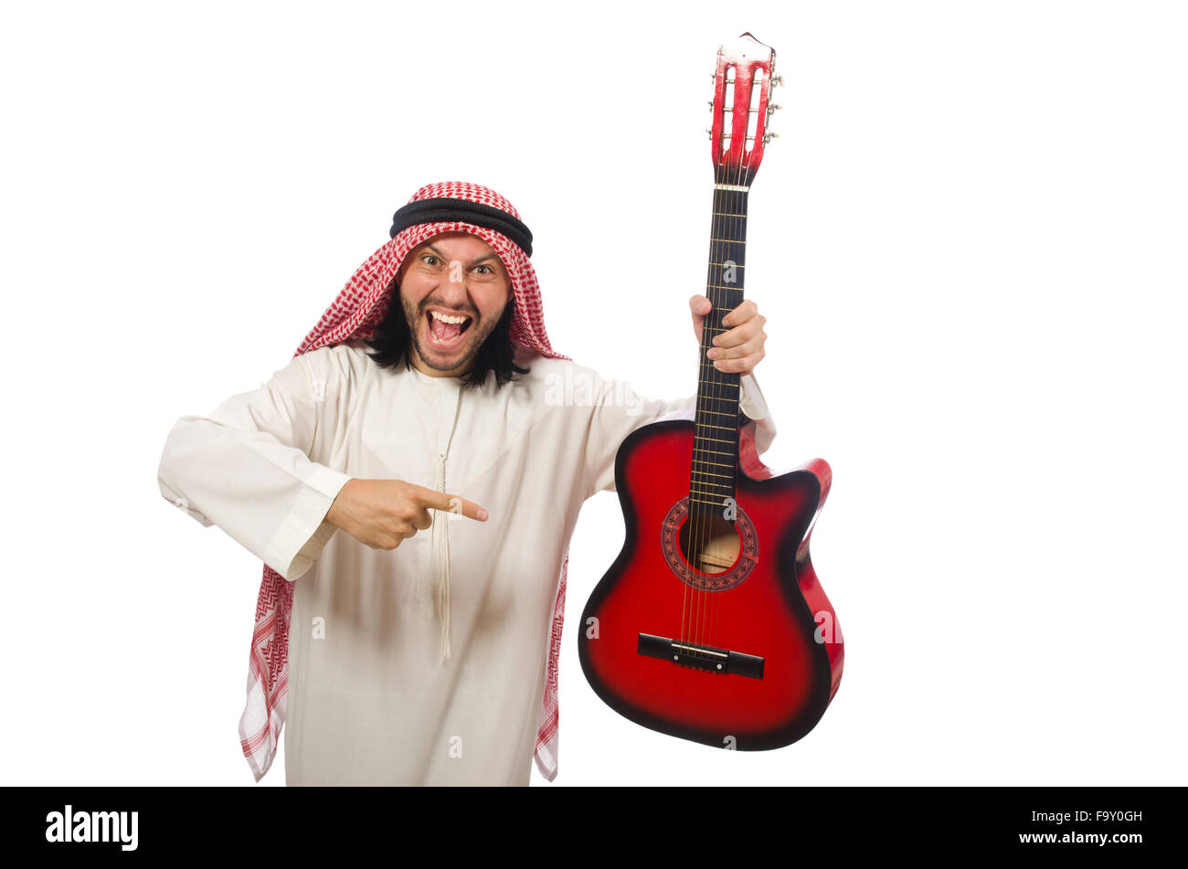 Arab man playing isolated on white Stock Photo - Alamy