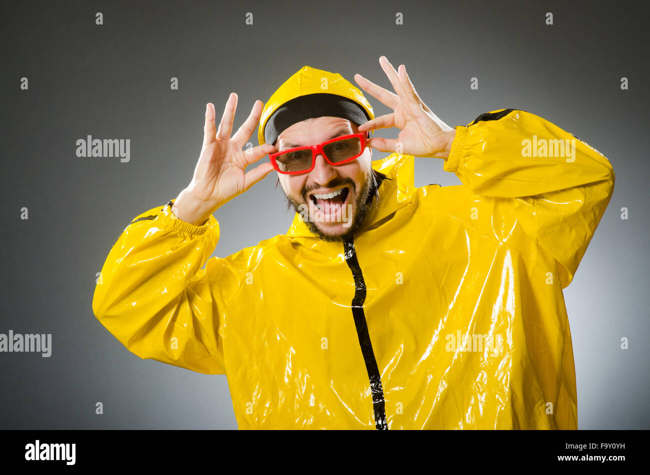 Funny man wearing yellow suit Stock Photo - Alamy