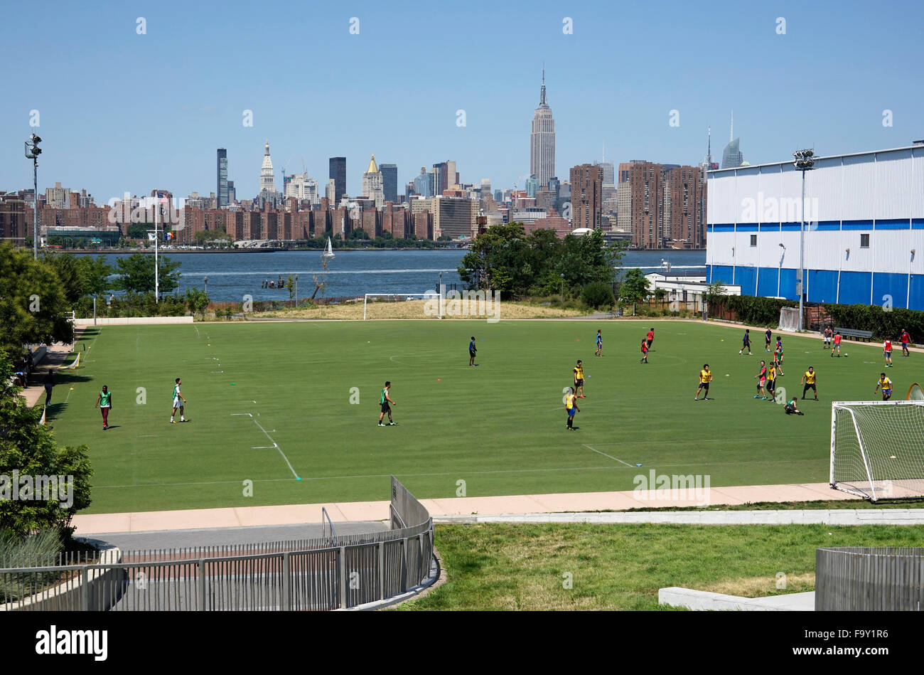 Soccer match in Bushwick Inlet Park in Williamsburg Brooklyn with East ...