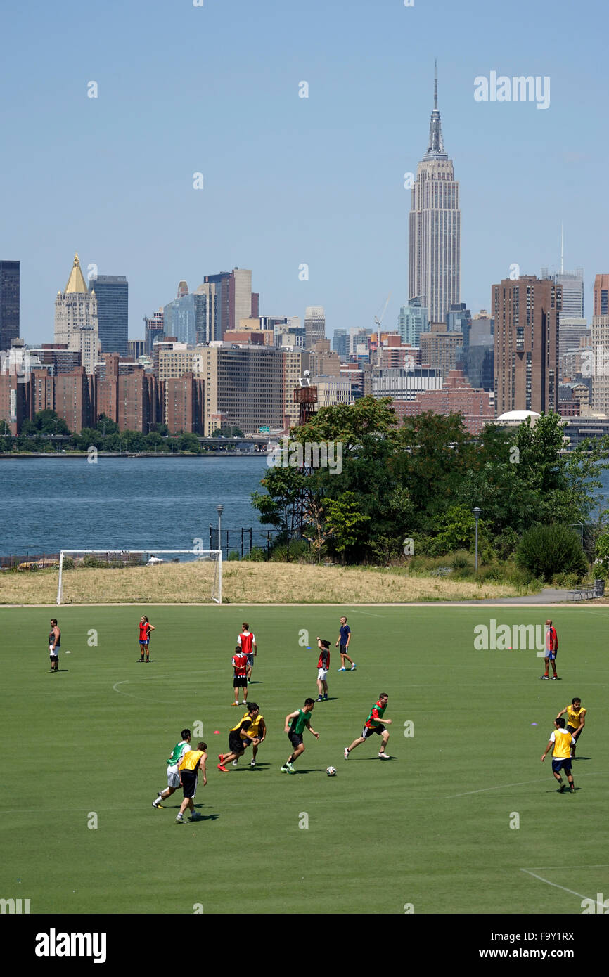 Soccer match in Bushwick Inlet Park in Williamsburg Brooklyn with East ...