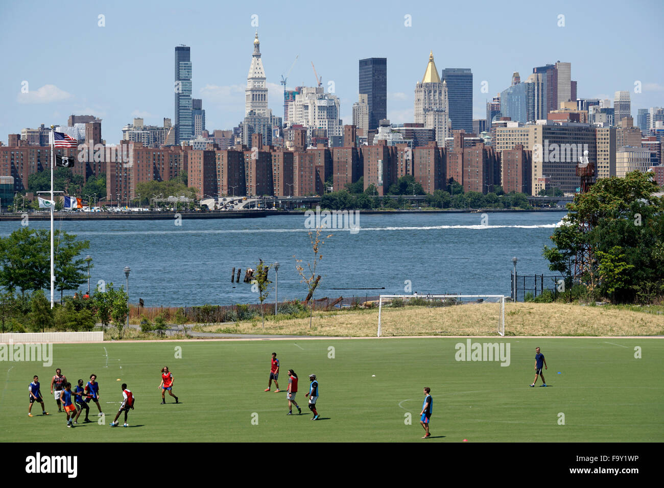 Soccer match in Bushwick Inlet Park in Williamsburg Brooklyn with East ...