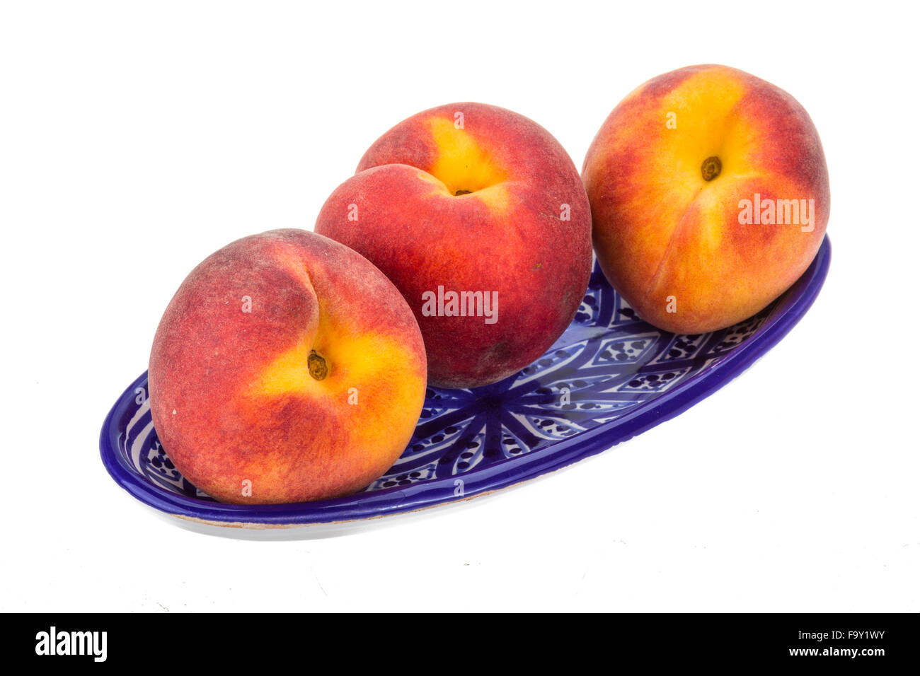 Bright ripe peaches isolated Stock Photo - Alamy