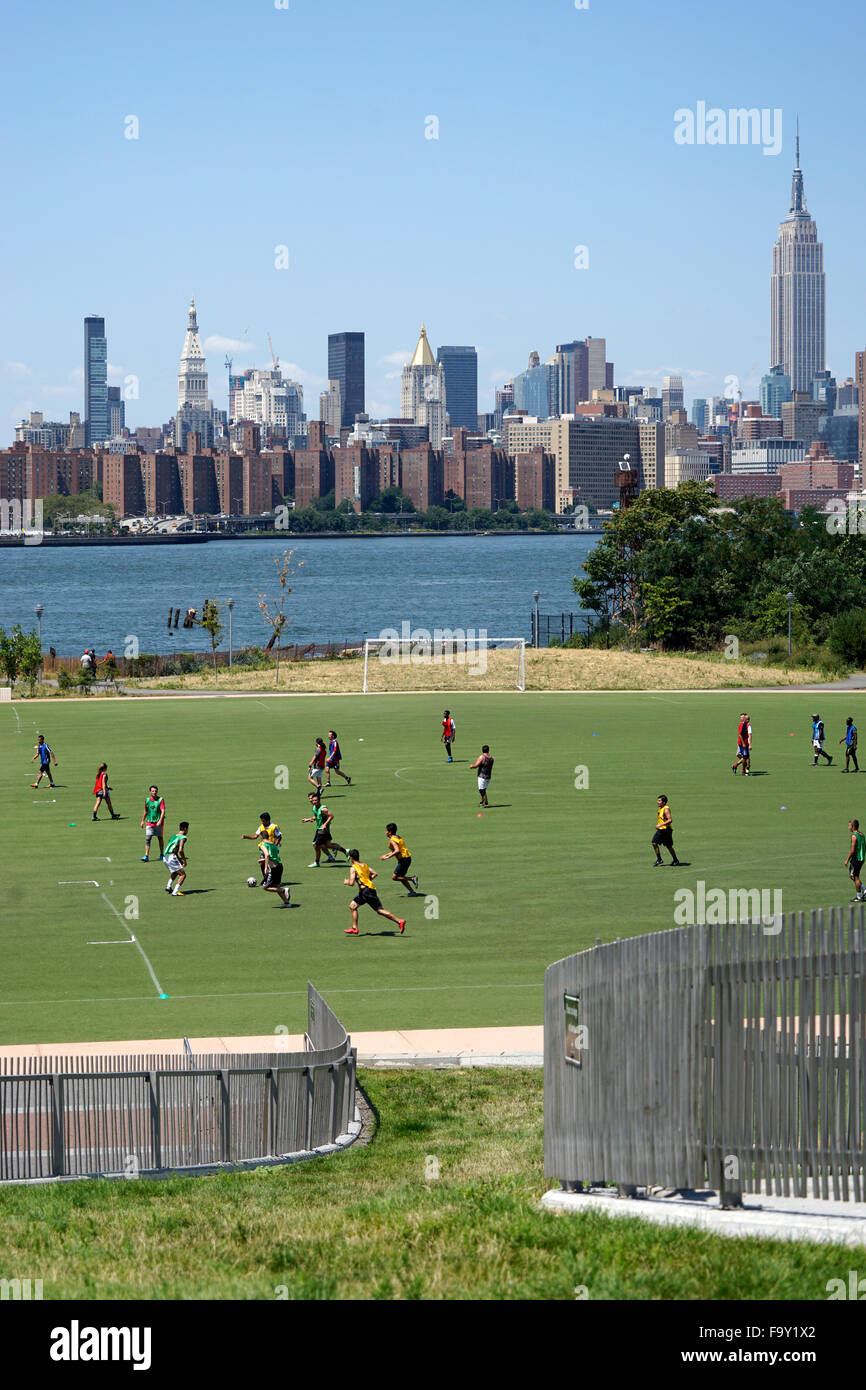 Soccer match in Bushwick Inlet Park in Williamsburg Brooklyn with East ...