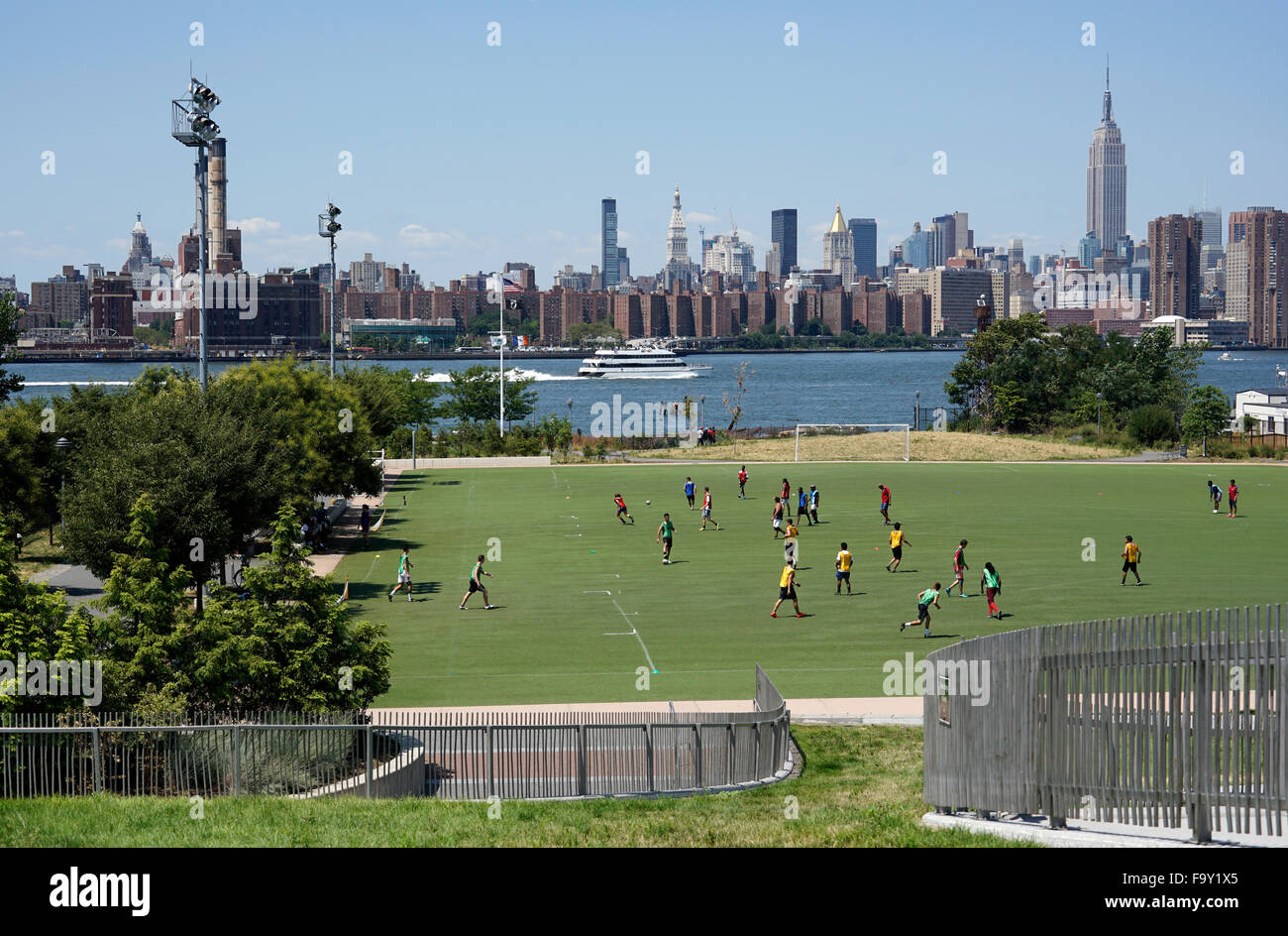 Soccer match in Bushwick Inlet Park in Williamsburg Brooklyn with East ...