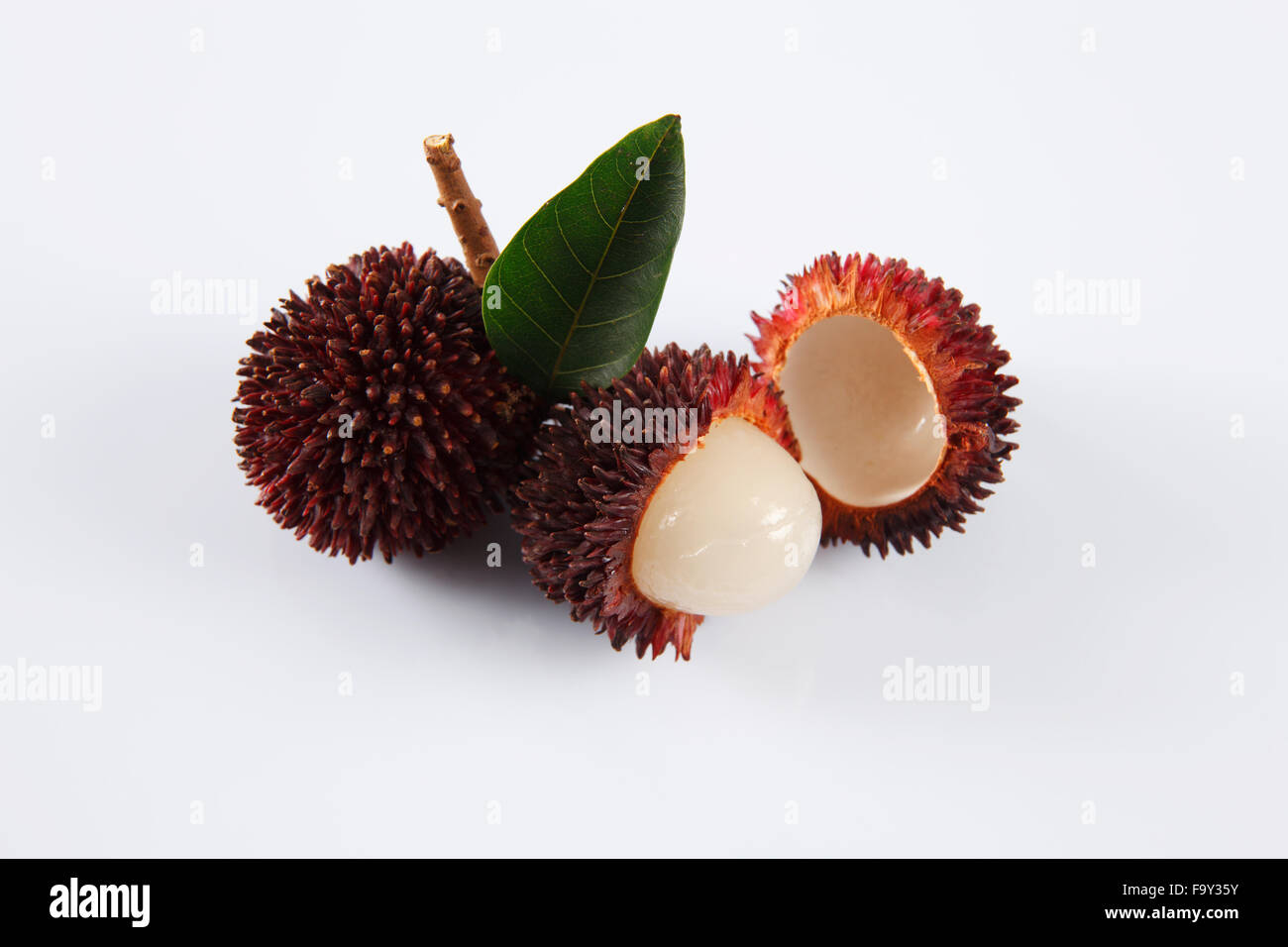 pulasan thick skin or wild rambutan on the white background Stock Photo ...