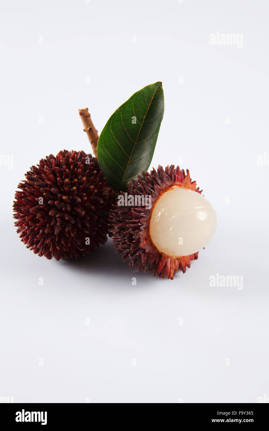 pulasan thick skin or wild rambutan on the white background Stock Photo ...