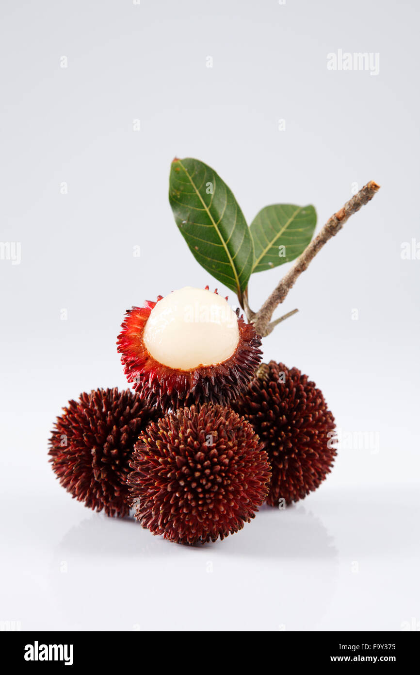 pulasan thick skin or wild rambutan on the white background Stock Photo ...