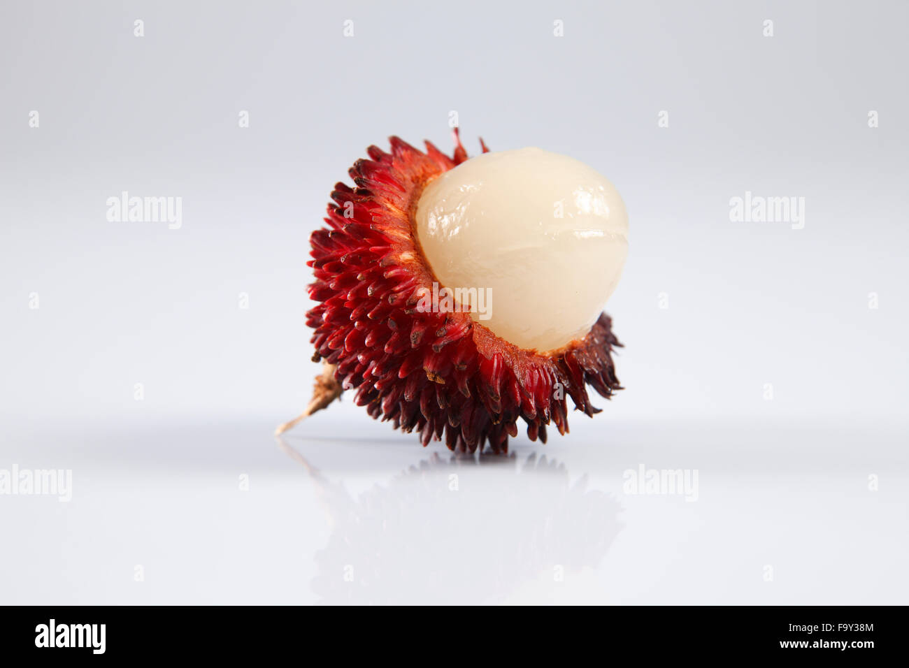pulasan thick skin or wild rambutan on the white background Stock Photo ...