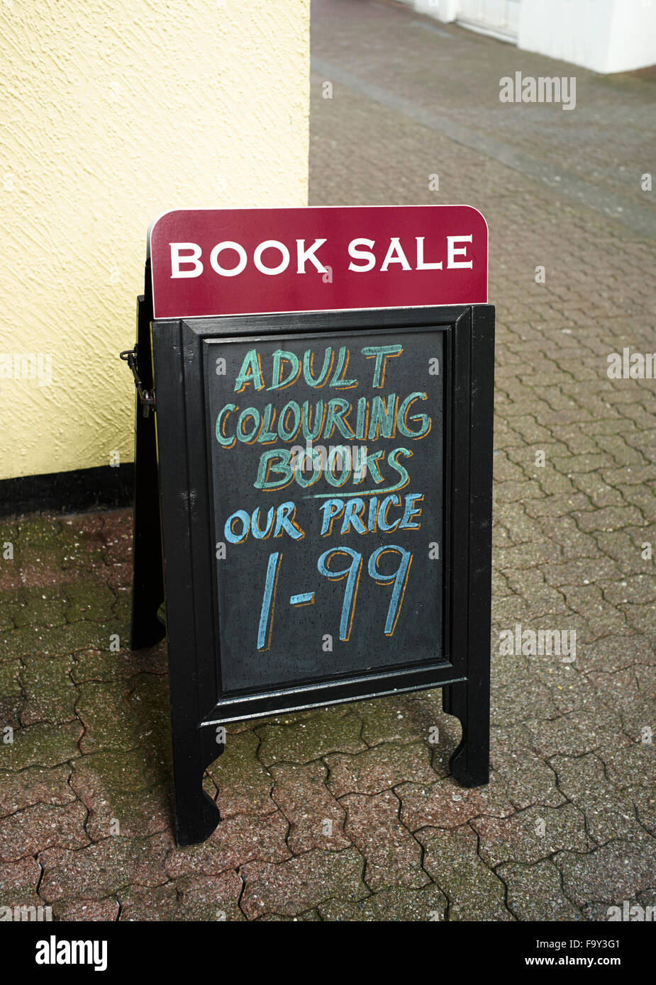 Adult colouring book sign Stock Photo - Alamy