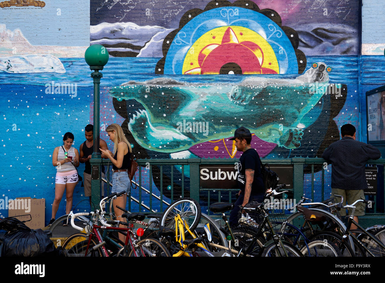 New York City subway station with ocean mural in the background and ...