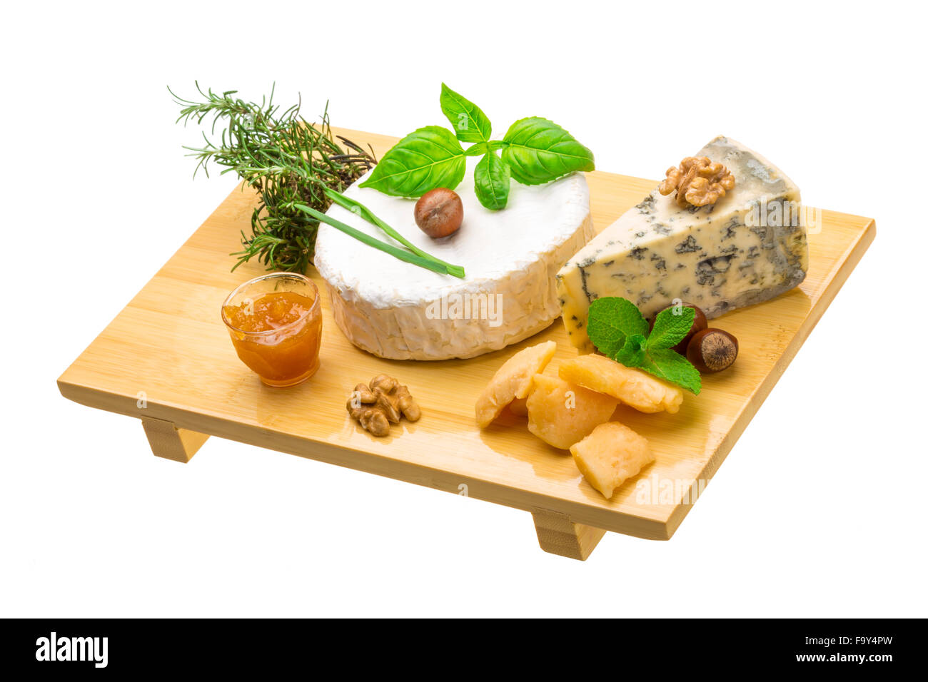 Assorted cheese - brie, dor blue and hard old yellow cheese Stock Photo ...