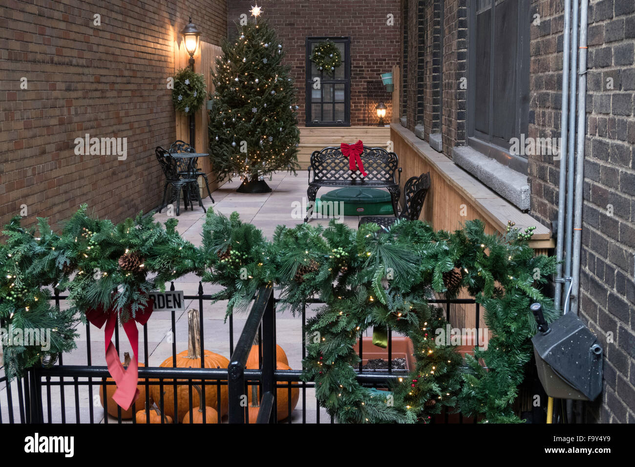 Apartment Building Alleyway Decorated for Christmas, NYC, USA Stock ...