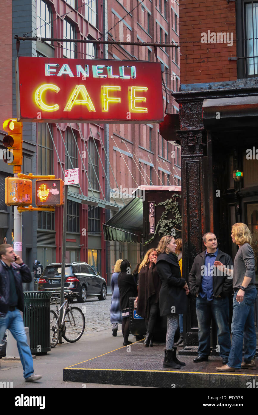 Crowded Sidewalk Outside Fanelli Cafe neon sign, SoHo, NYC Stock Photo ...