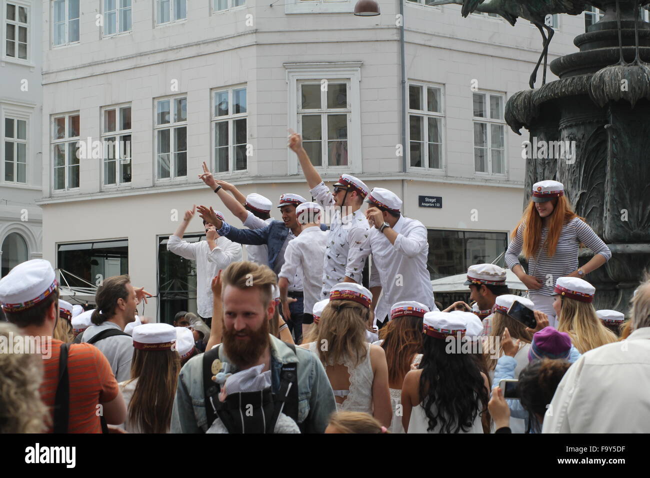 Students who have graduated from high school in Copenhagen celebrating ...