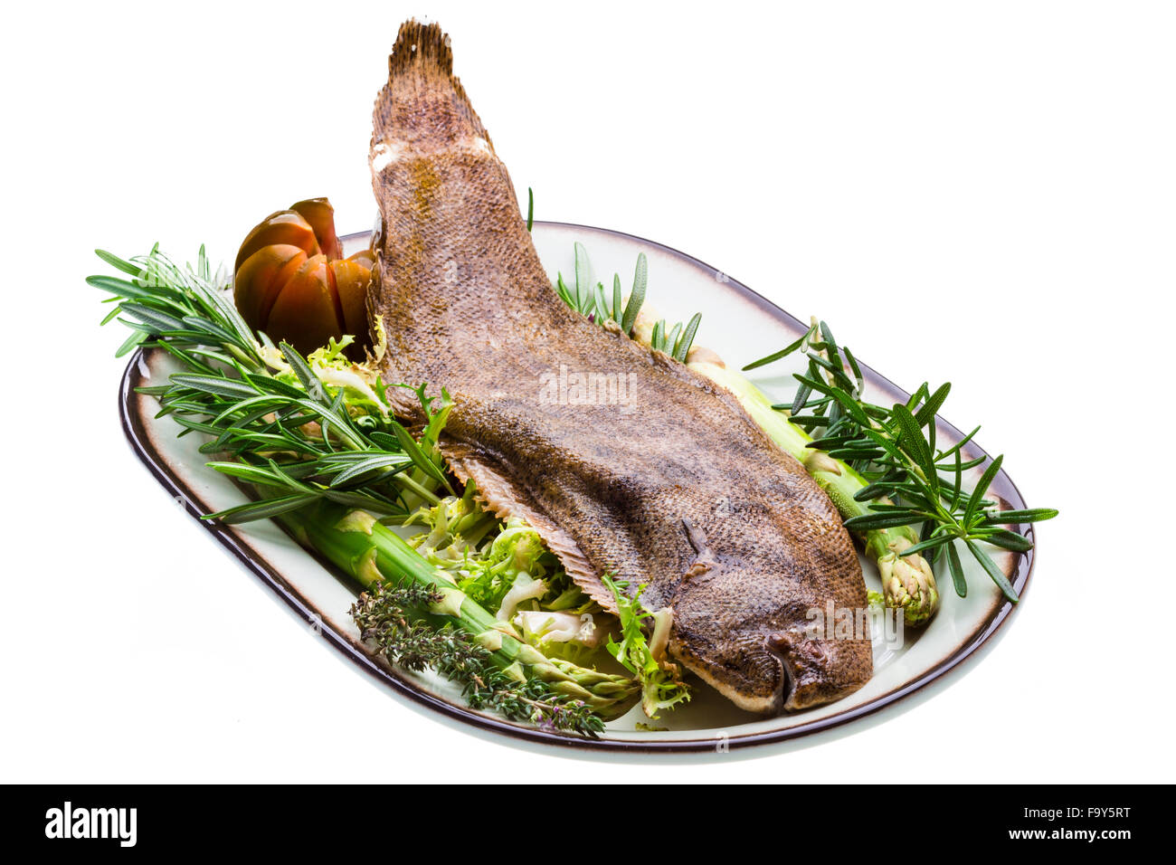 Fish Dover sole roasted Stock Photo - Alamy