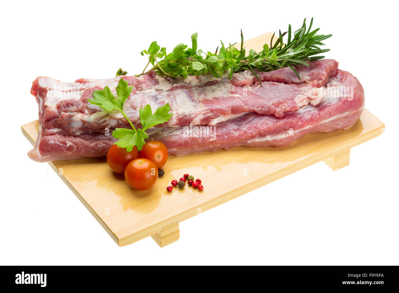 Raw pork meat with herbs and spices Stock Photo - Alamy
