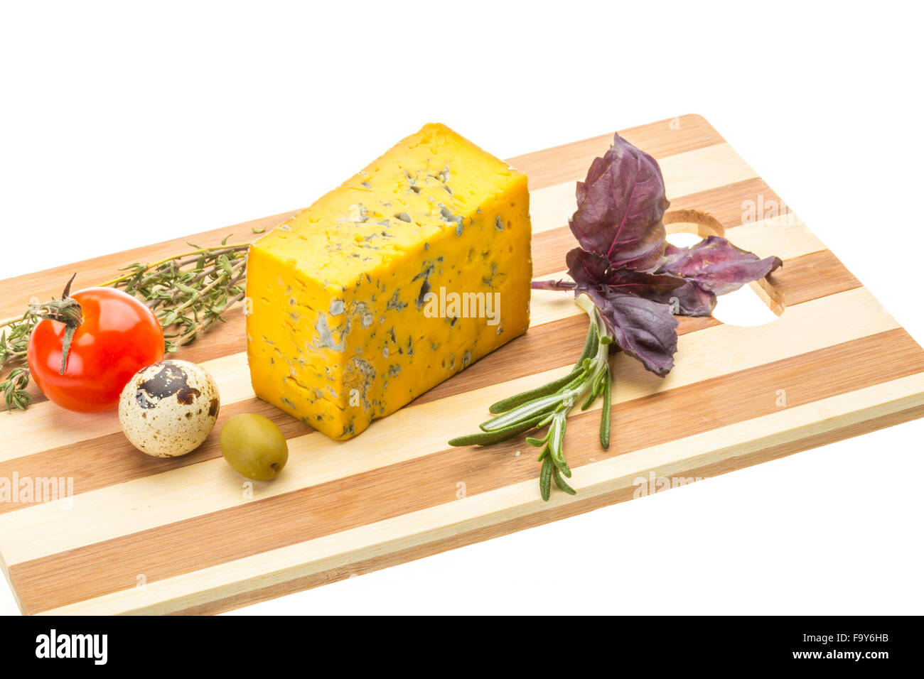 Yellow cheese with blue mold Stock Photo - Alamy