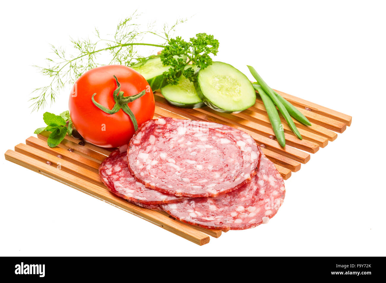 Fresh ripe salami with vegetables Stock Photo - Alamy