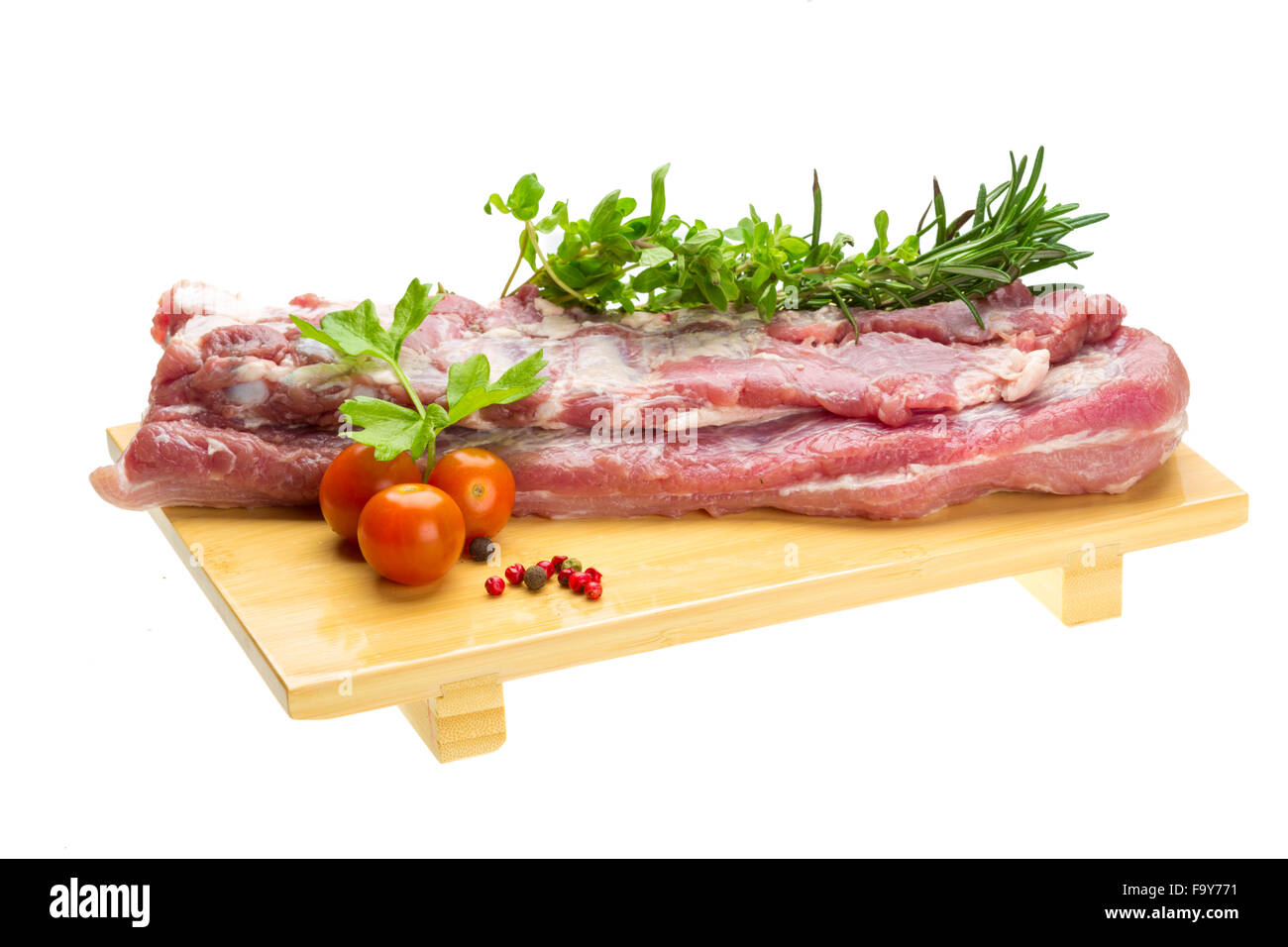 Raw pork meat with herbs and spices Stock Photo - Alamy