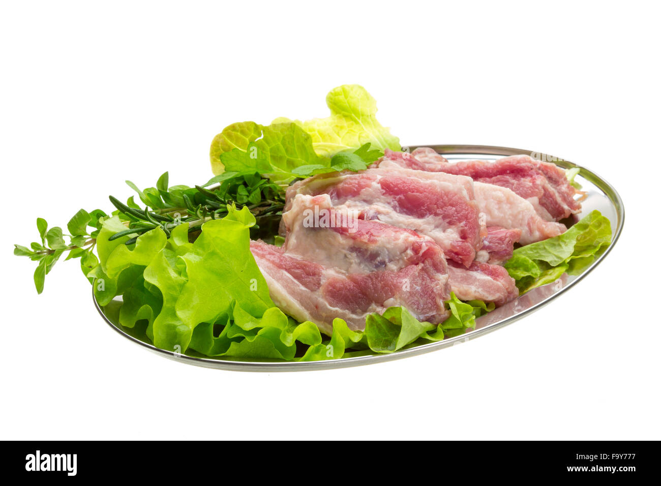 Raw pork meat with herbs and spices Stock Photo - Alamy