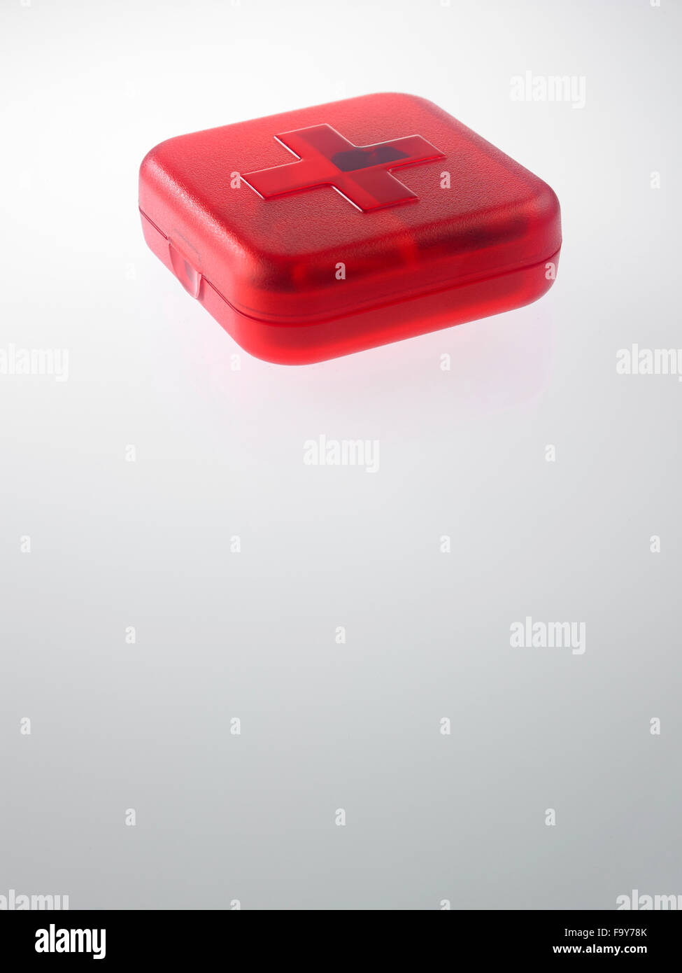 red pill box with medicine Stock Photo - Alamy