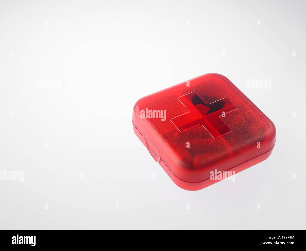 red pill box with medicine Stock Photo - Alamy