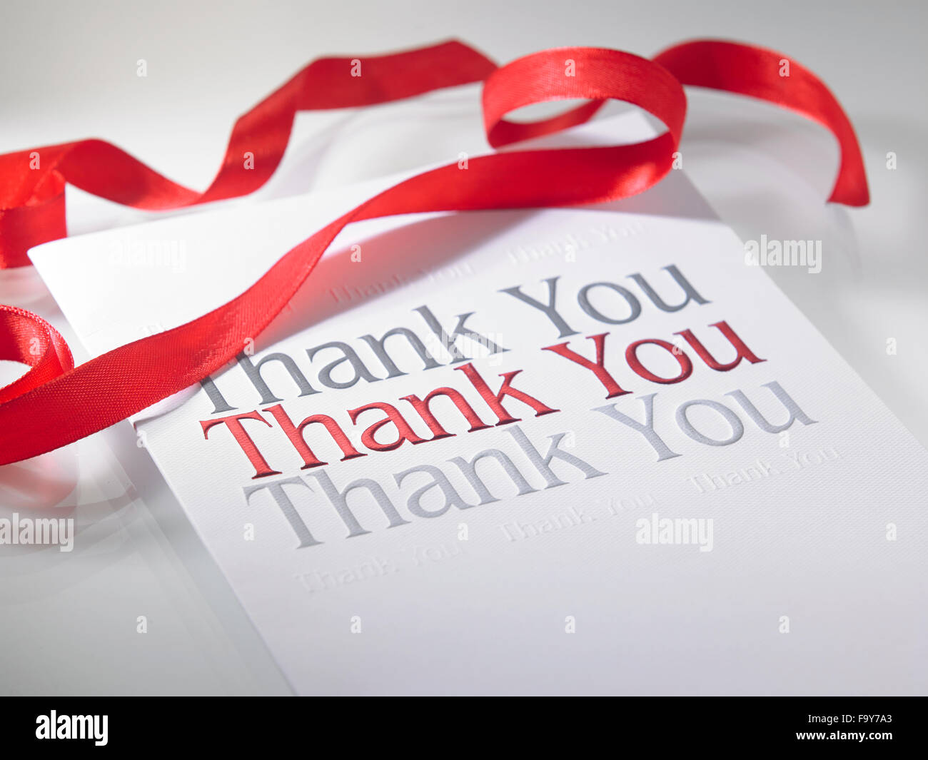Thank you card with the ribbon Stock Photo - Alamy