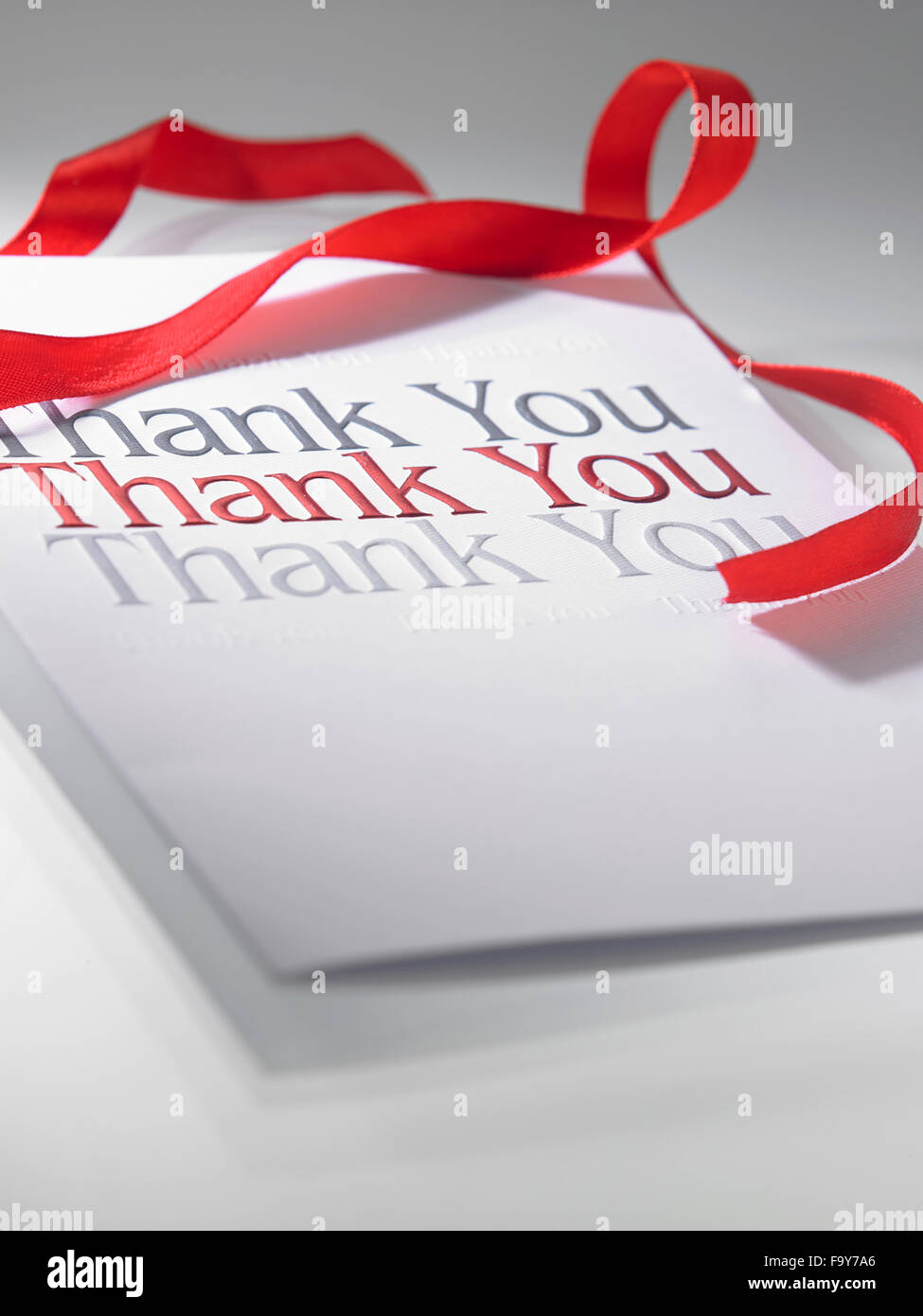 Thank you card with the ribbon Stock Photo - Alamy